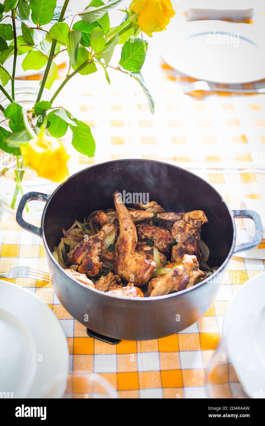 Roasted rabbit cooked in a cast iron casserole Stock Photo - Alamy