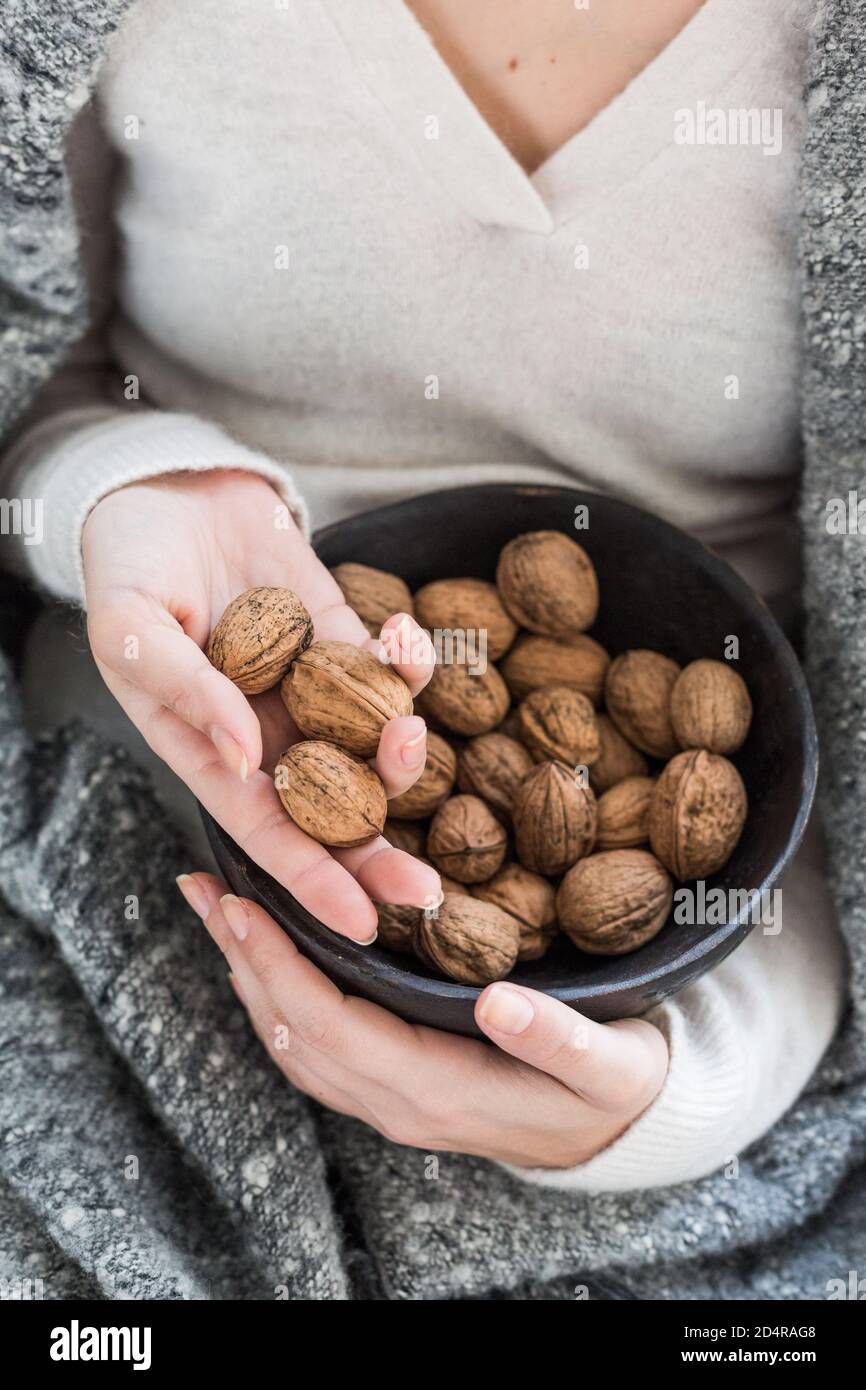 Eating walnuts hi-res stock photography and images - Alamy