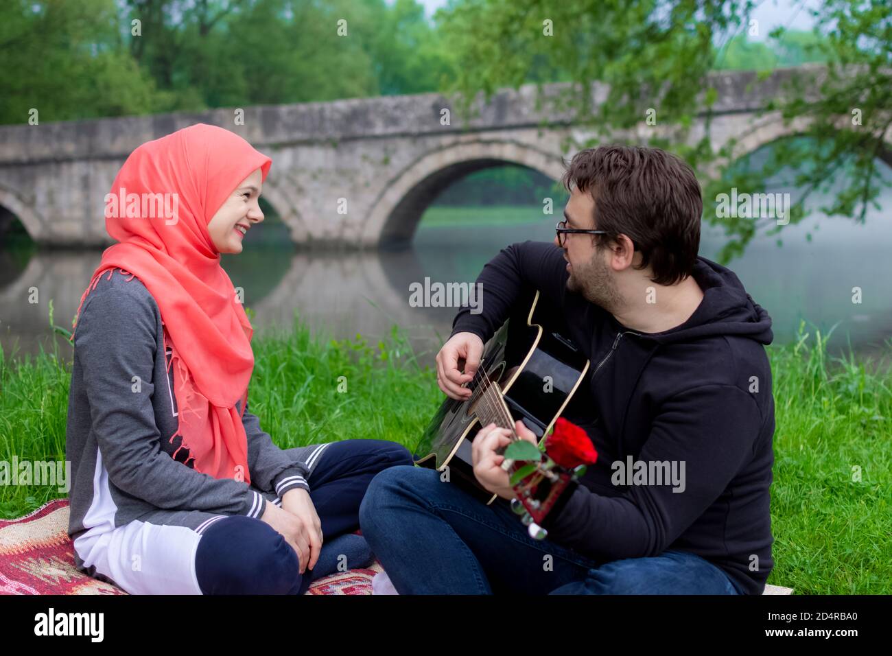 Muslim couple enjoying the day in the nature Stock Photo - Alamy