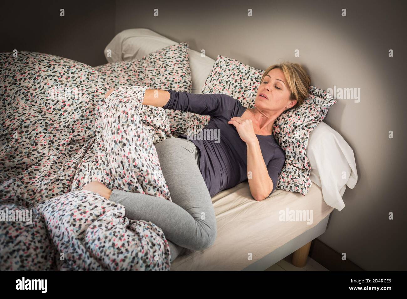 Woman hot flash bed hi-res stock photography and images - Alamy