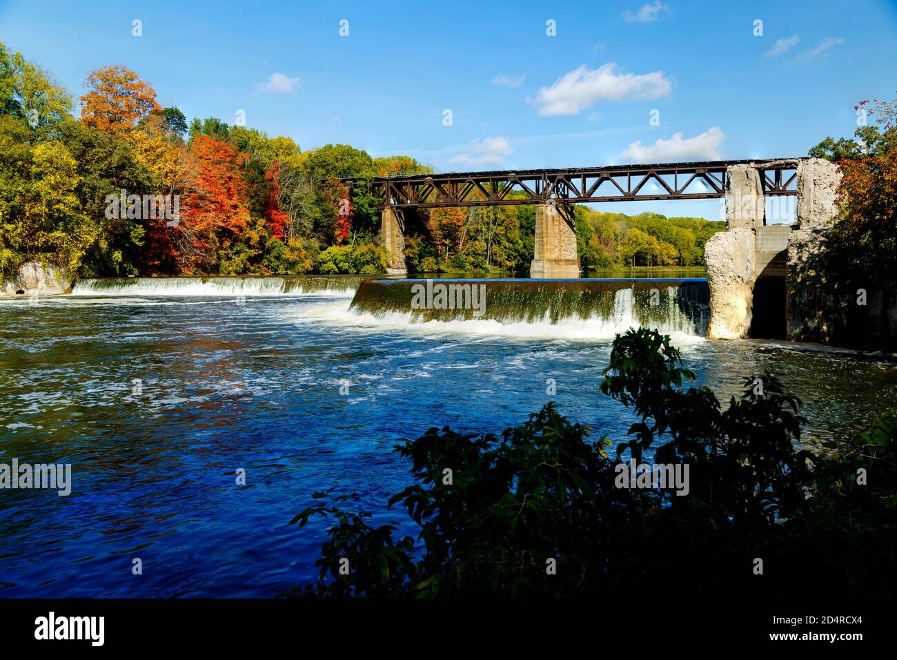 Penmans Dam with Railway Trestle in Fall colors on the Grand River ...