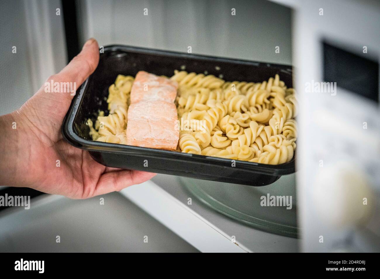 Using microwave oven hi-res stock photography and images - Alamy