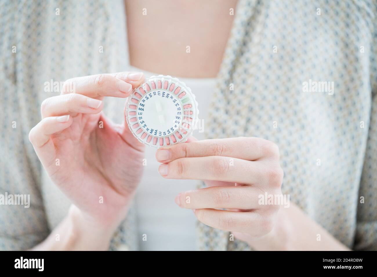 Woman taking an hormone replacement therapy pills Stock Photo - Alamy