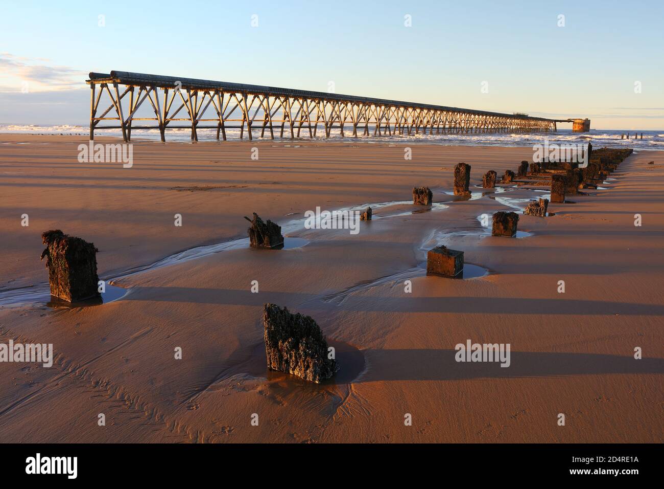 View of a wooden derelict Pier with Blue Sky at Hartlepool, County ...