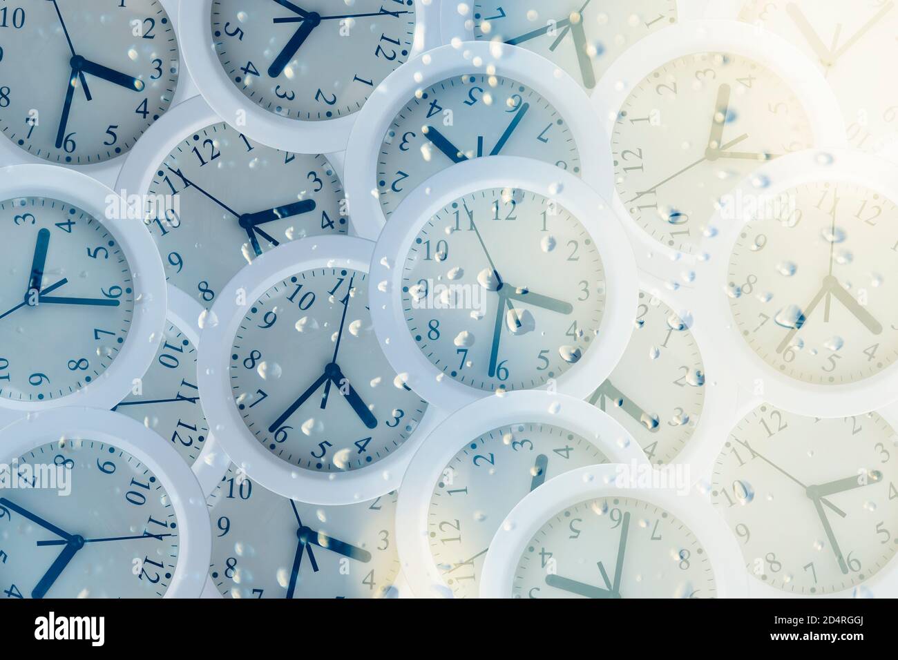 Background made with many clocks covered in water drops Stock Photo - Alamy