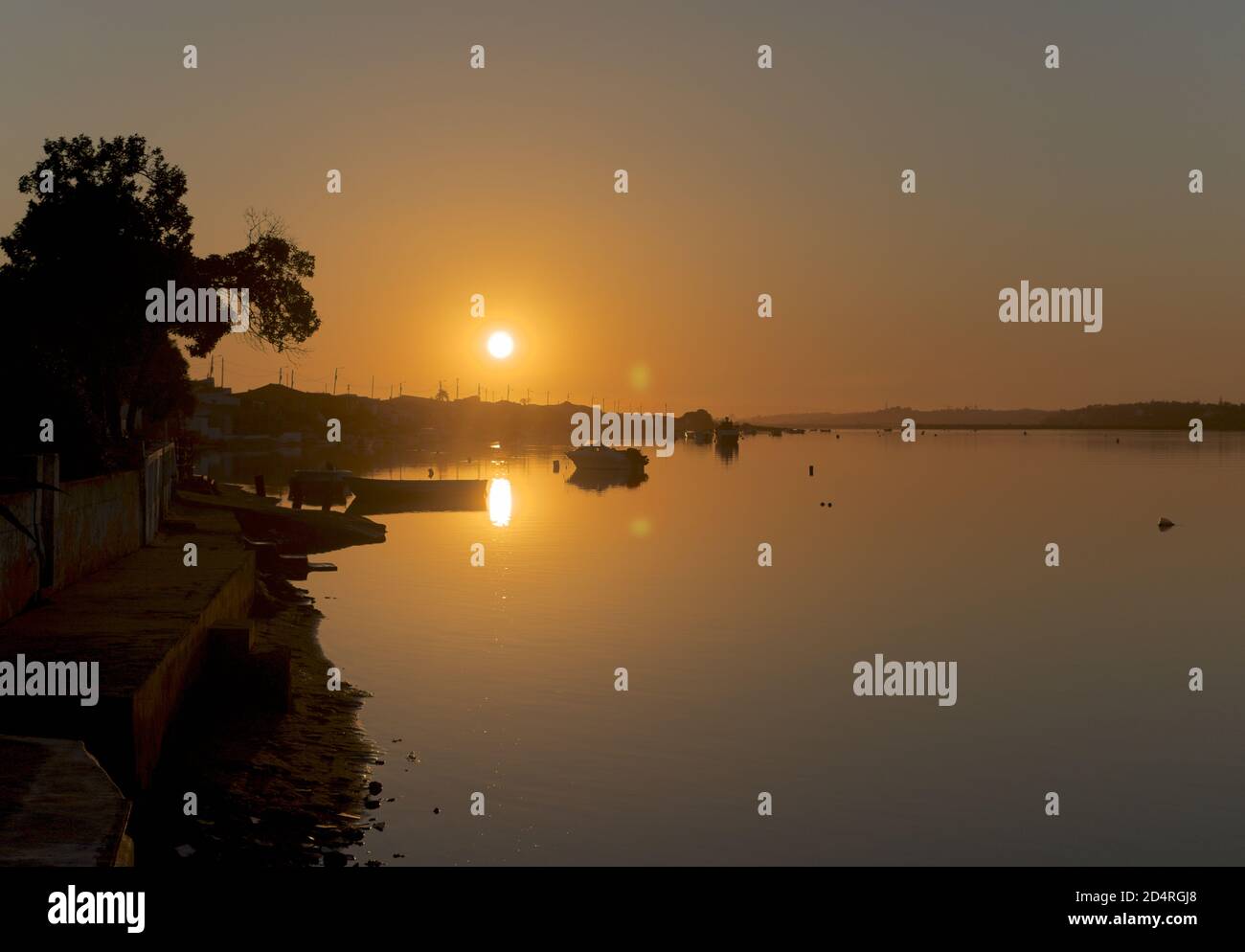 Sunset at Praia de Faro, Portugal Stock Photo - Alamy