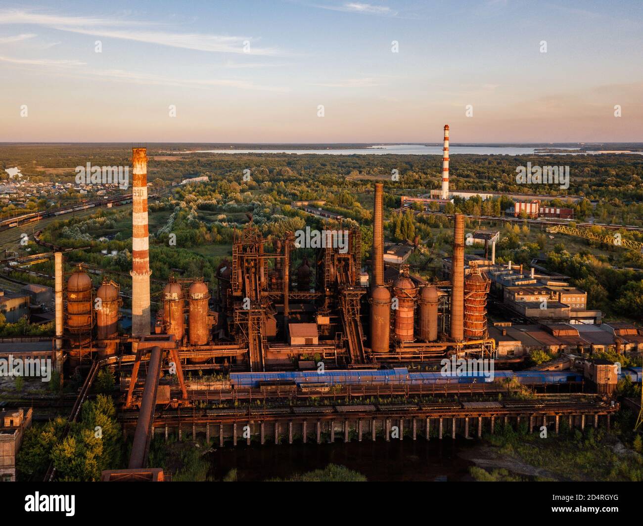 Blast furnace equipment of the metallurgical plant at the sunset ...