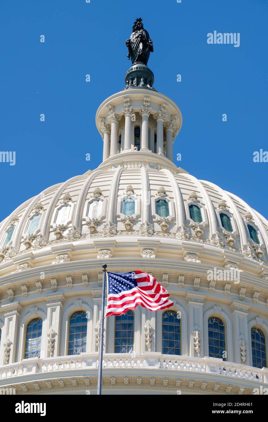Us capitol with american flag hi-res stock photography and images - Alamy