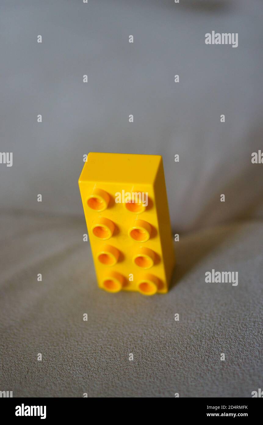 POZNAN, POLAND - Mar 19, 2016: Plastic yellow Lego Duplo toy brick in ...