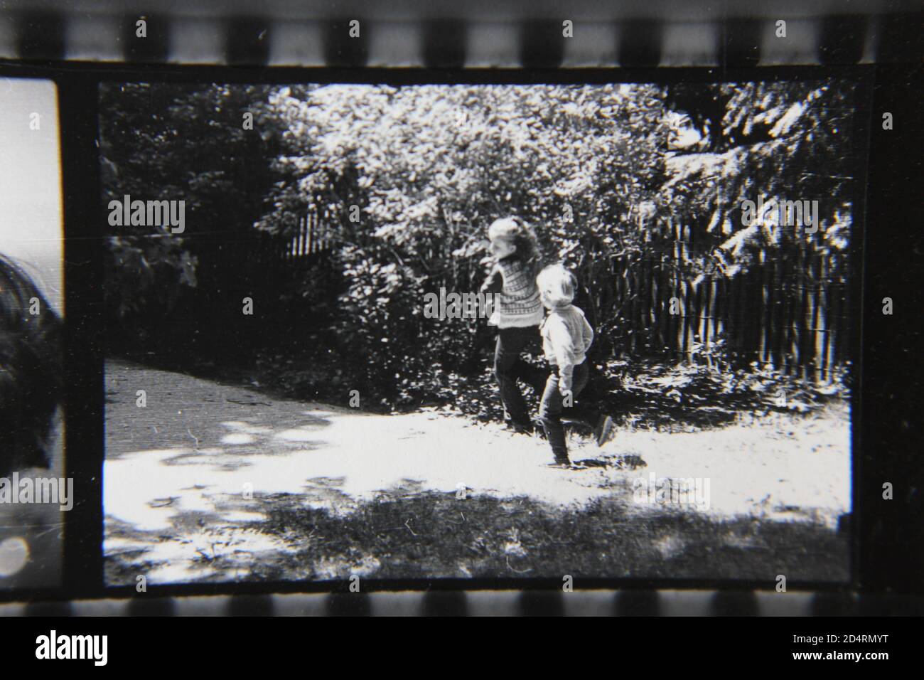 Running children 70s hi-res stock photography and images - Alamy