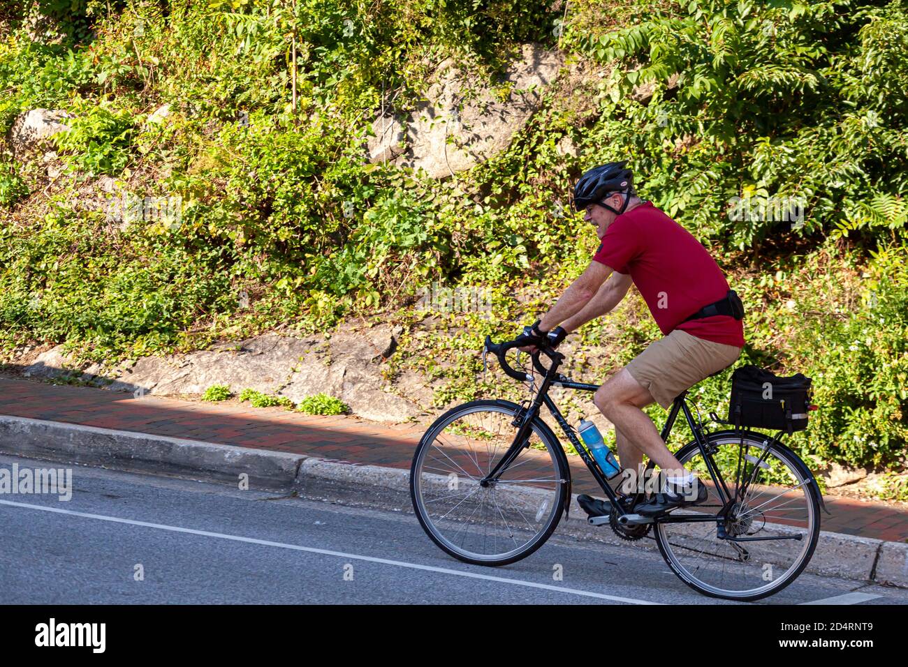 Senior cyclist wearing gloves hi-res stock photography and images - Alamy