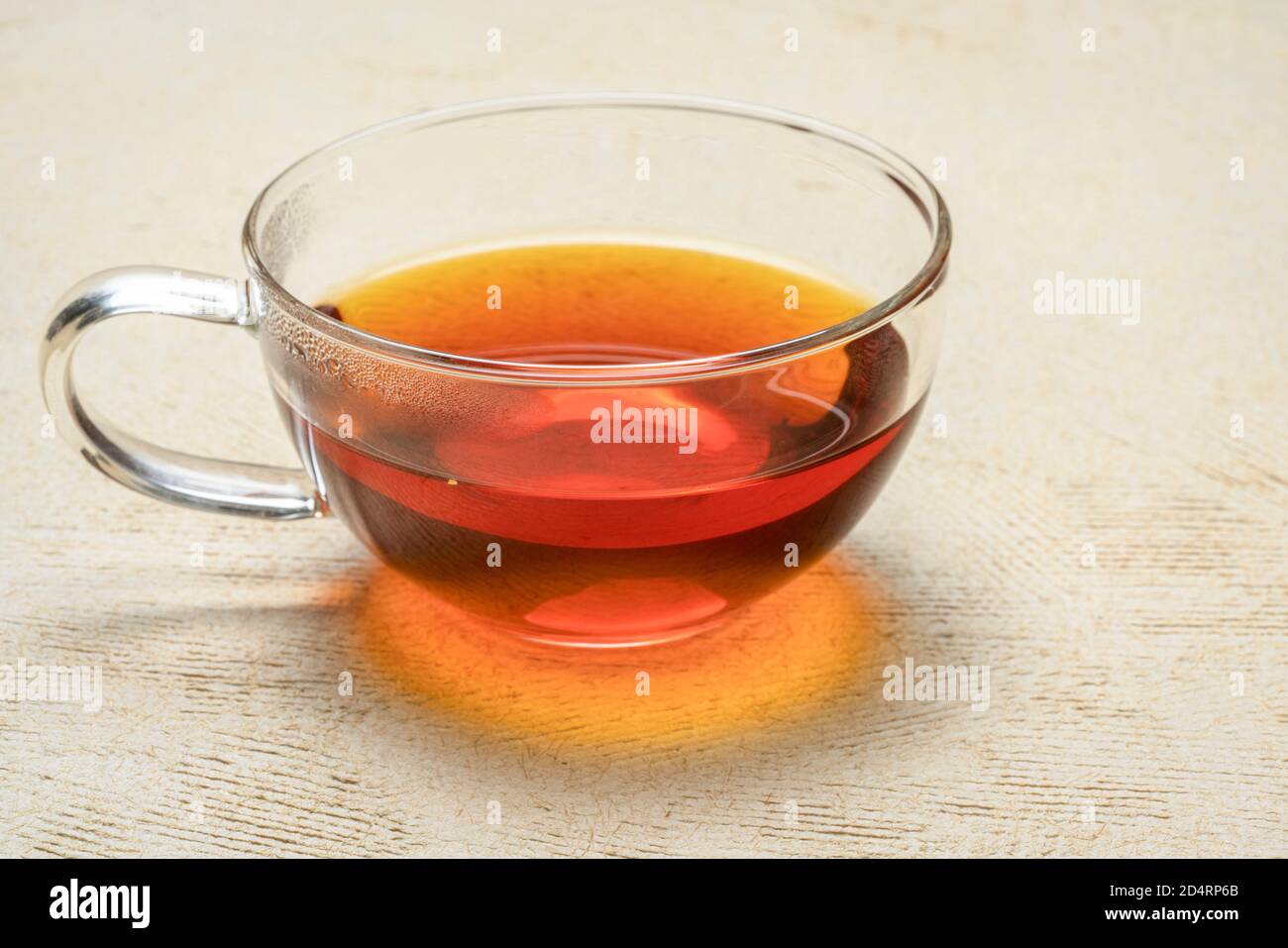 rooibos red tea - a glass cup of a hot drink, tea made from the South ...