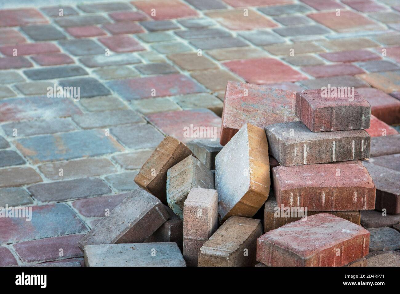 construction of brick paved sidewalk, half built pavement road Stock ...