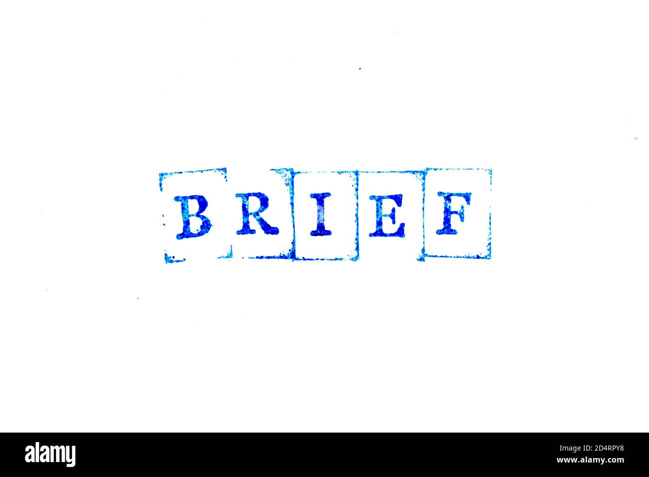Blue color ink of rubber stamp in word brief on white paper background ...