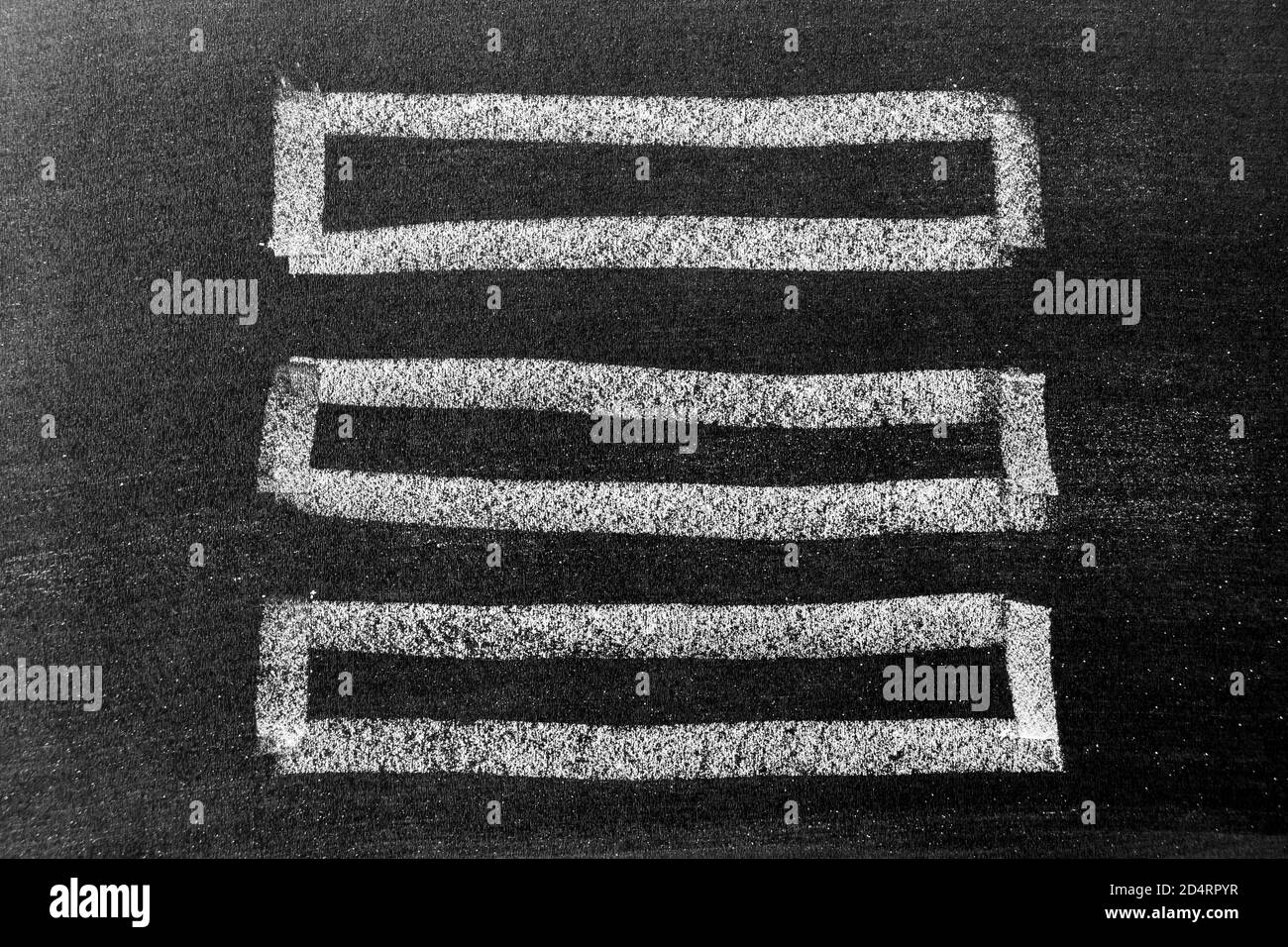 White chalk hand drawing in square or banner shape on black board ...