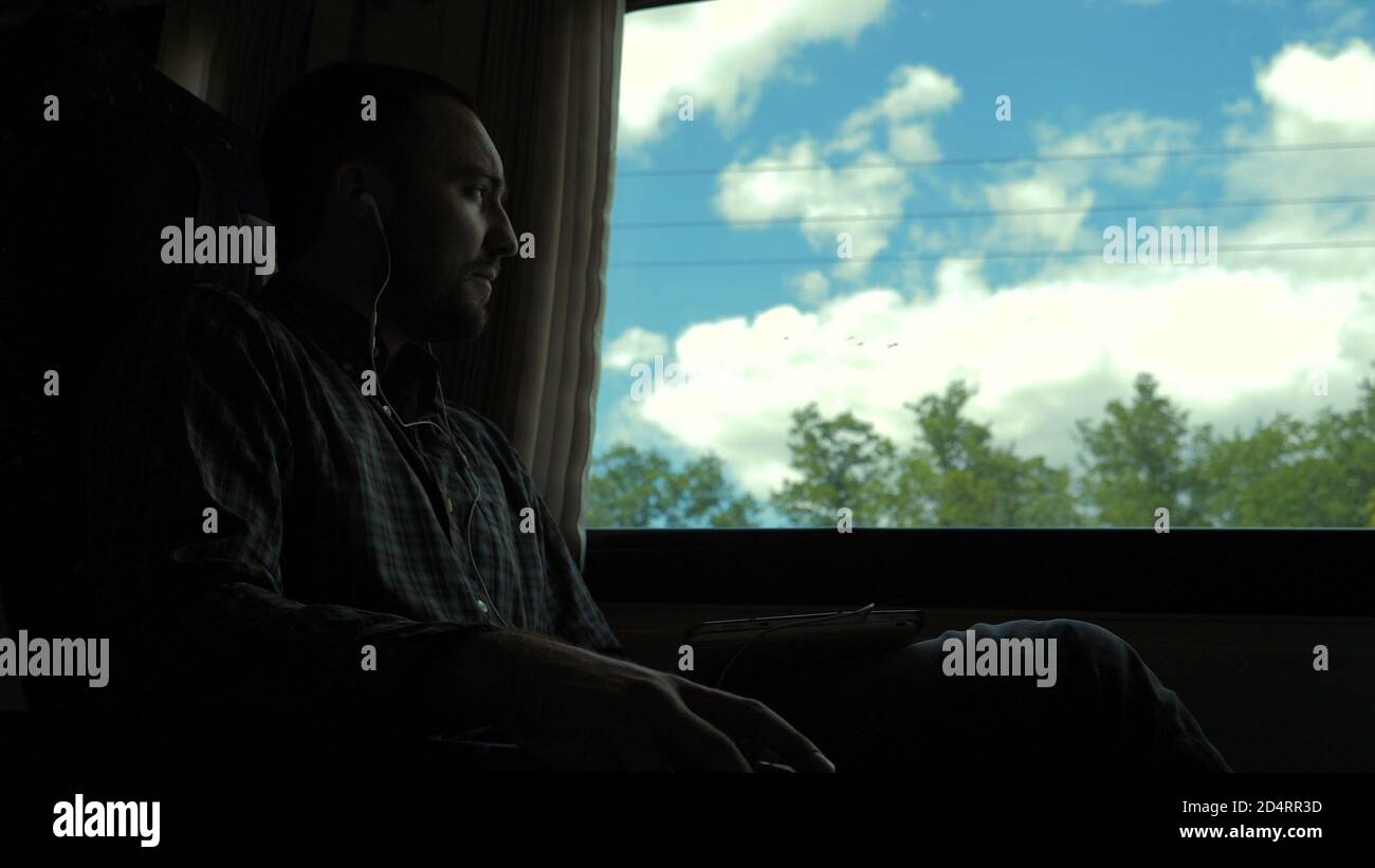 Headphones singing on train hi-res stock photography and images - Alamy