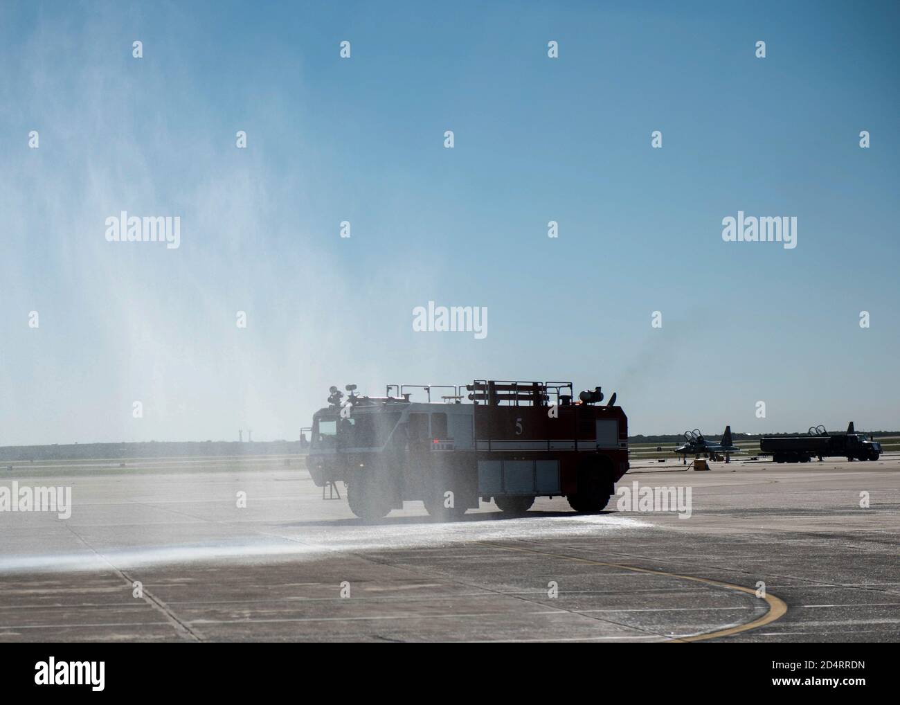 Firefighters rush to a scenario where an unconscious pilot is in a ...