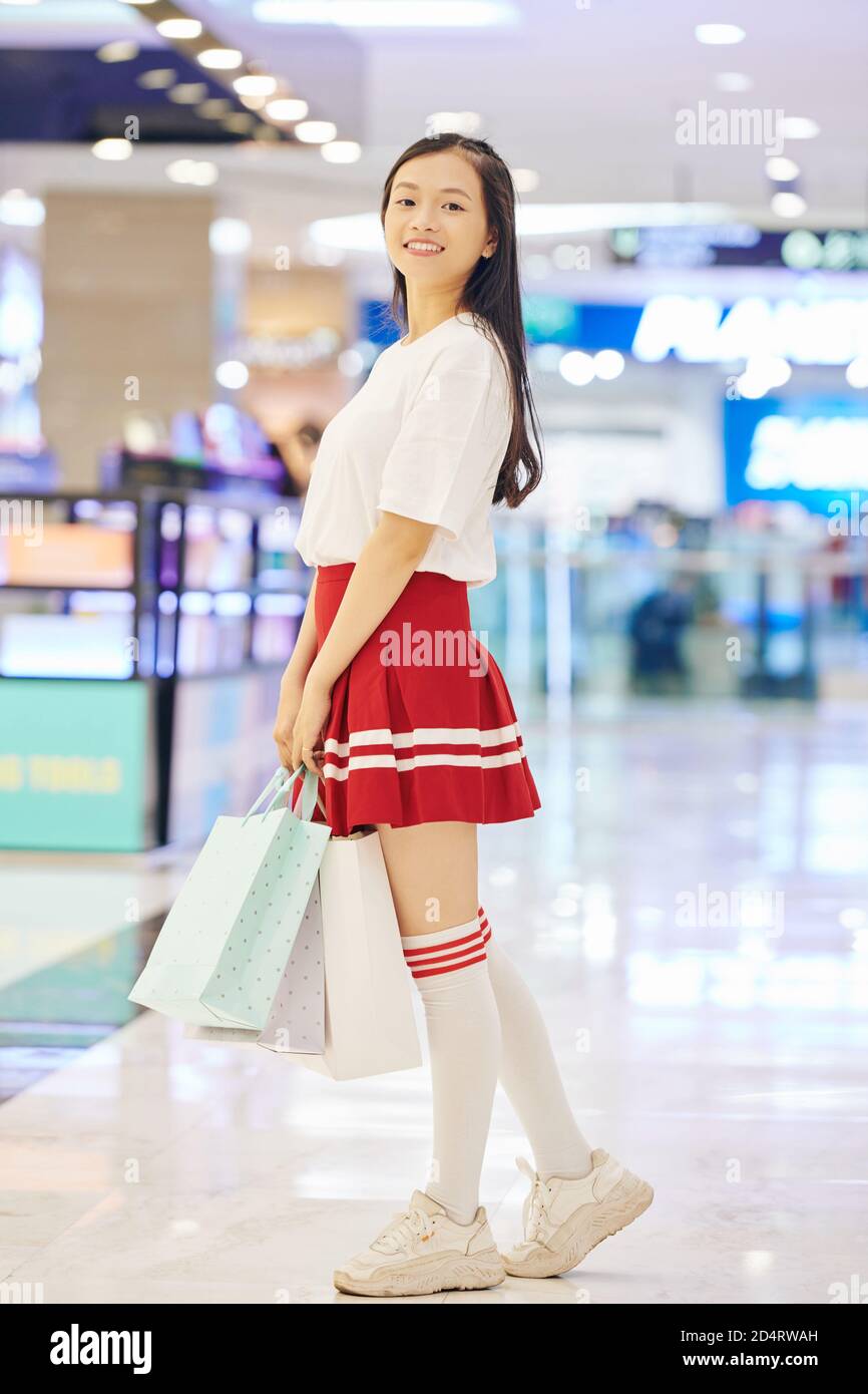 Girls Standing At Mall