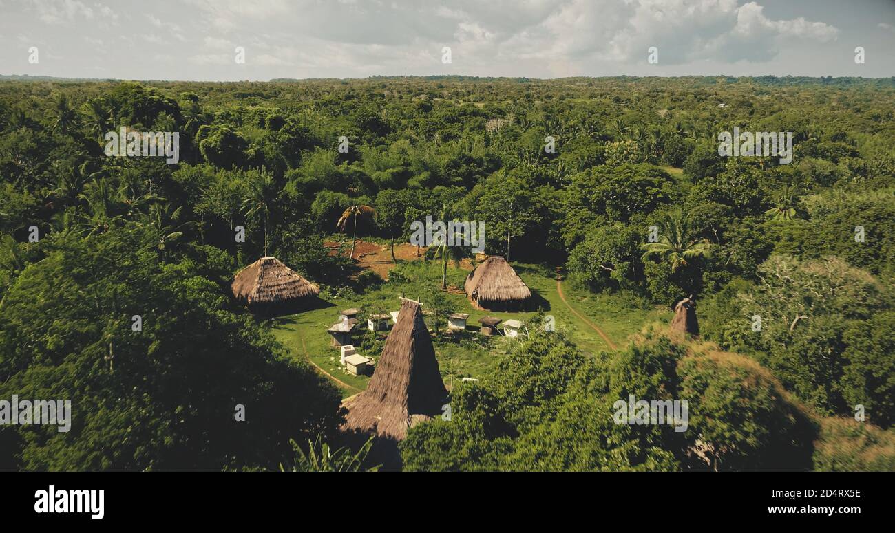 Indonesia countryside with traditional houses roofs and animal barn ...