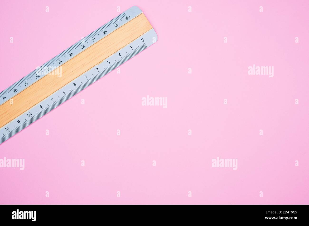Top view of a colorful ruler isolated on a pink background Stock Photo ...