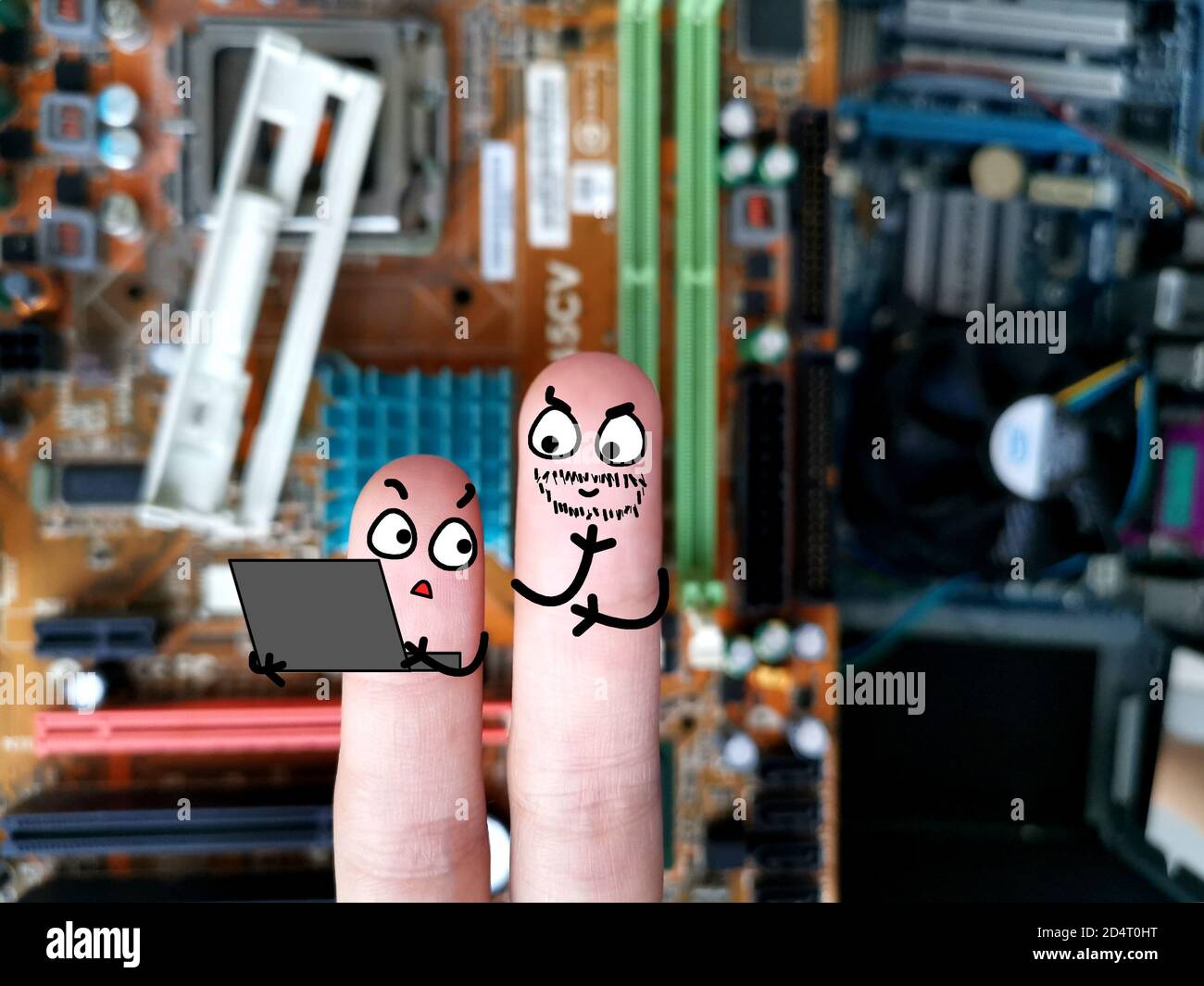Two fingers are decorated as two person. They are hacking the computer ...