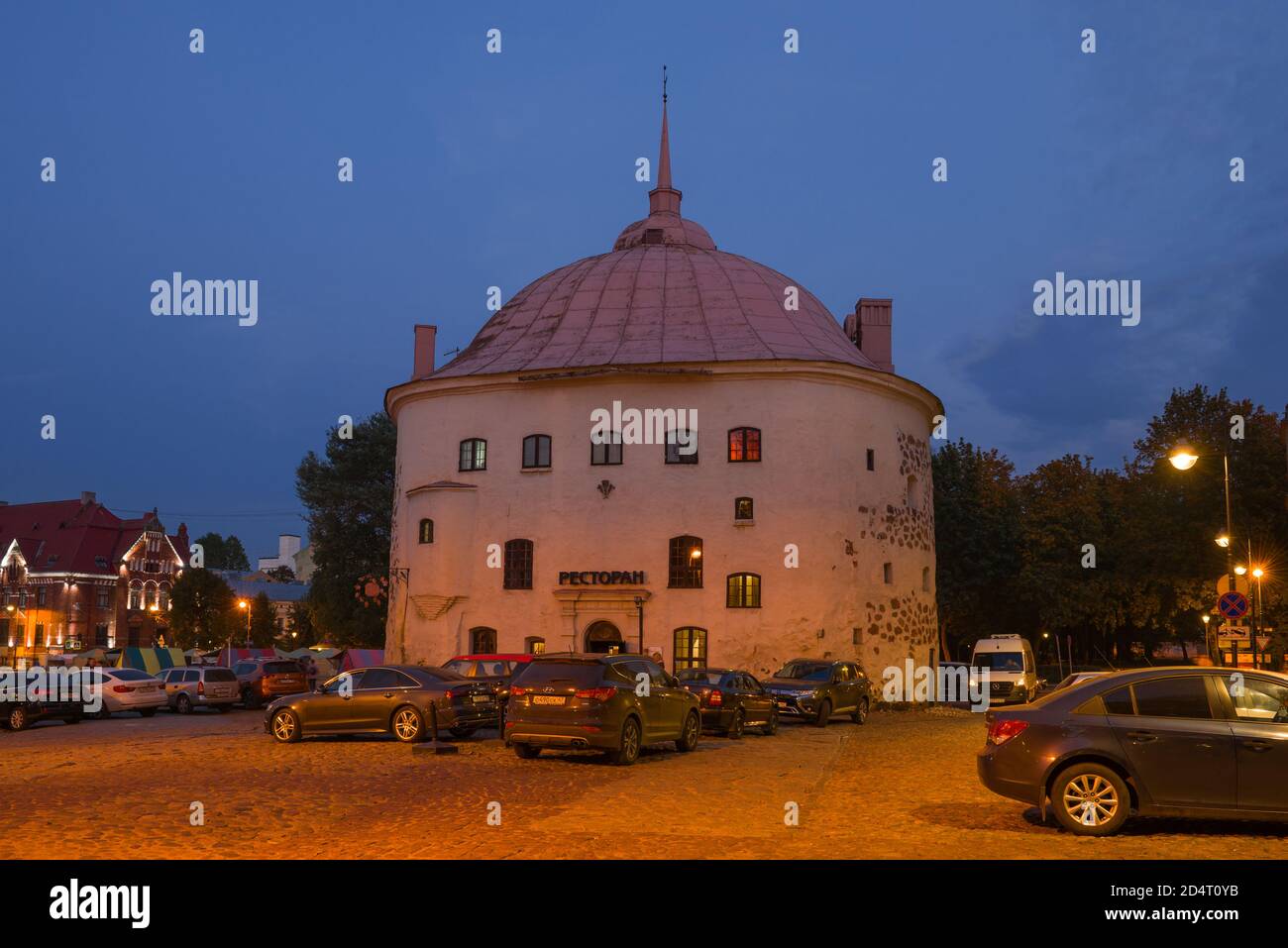 Ancient round tower in October twilight. Vyborg, Russia Stock Photo - Alamy