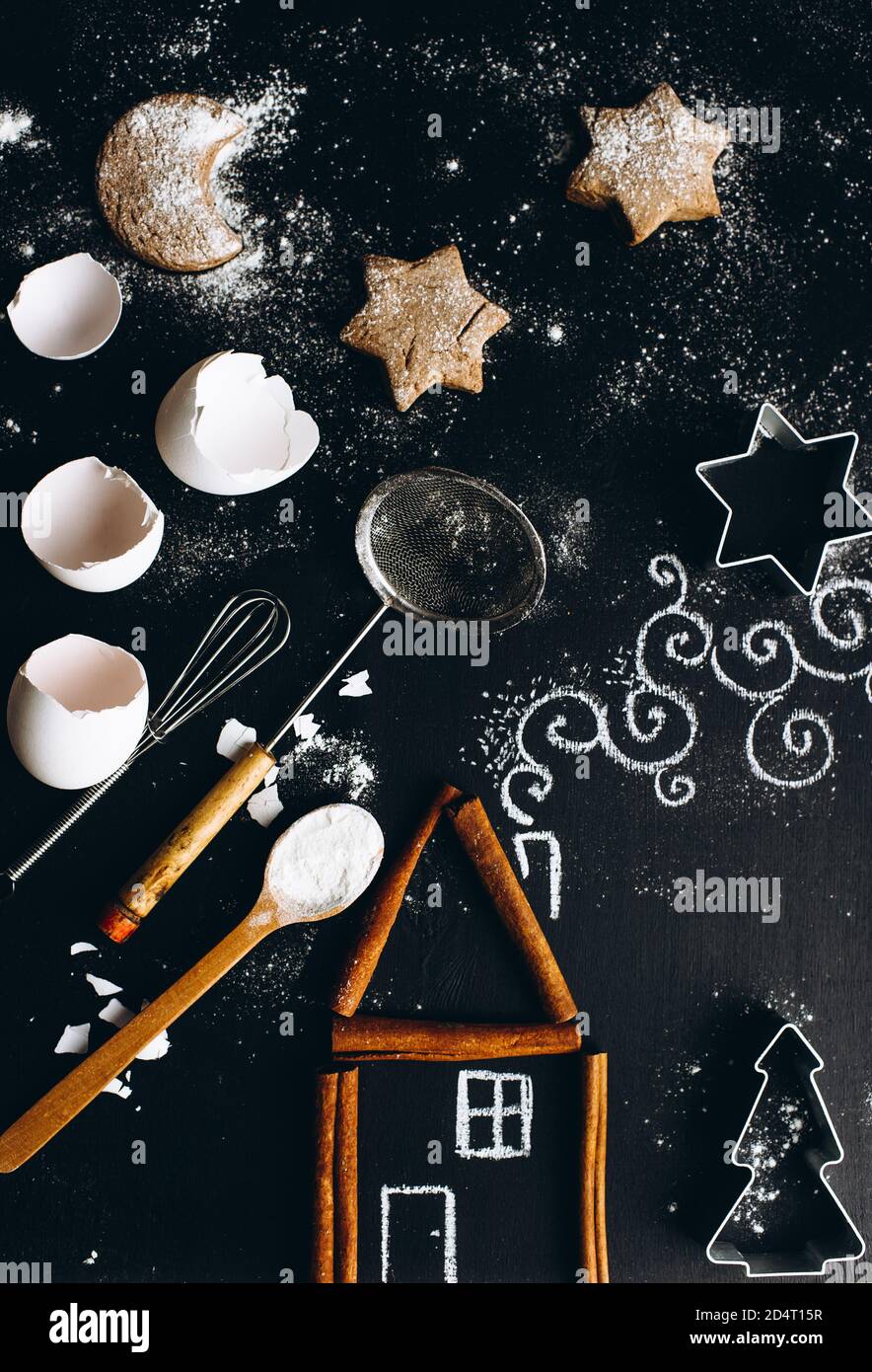 Cinnamon house on the table is complemented by a chalk pattern and ...