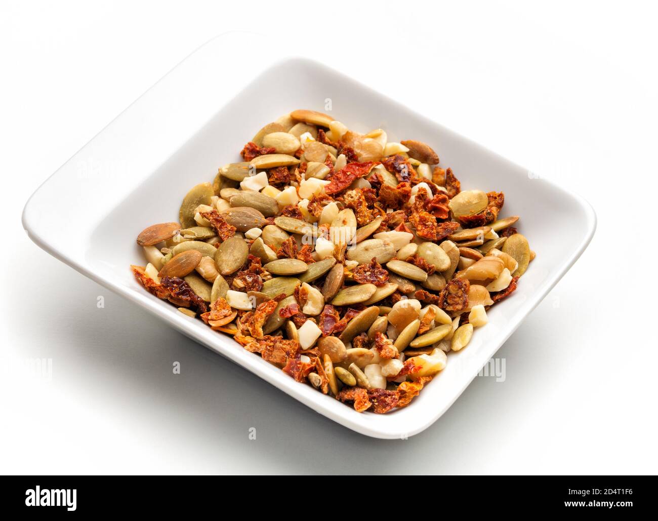 Mixed dried shelled fruit and dried tomatoes. Salad Dressing. white ...