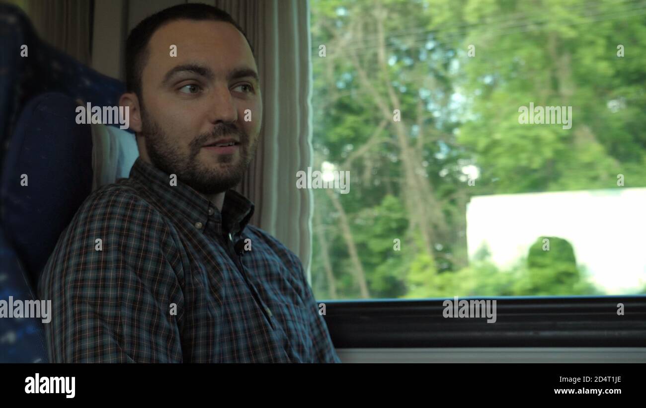 Businessman riding subway train hi-res stock photography and images - Alamy