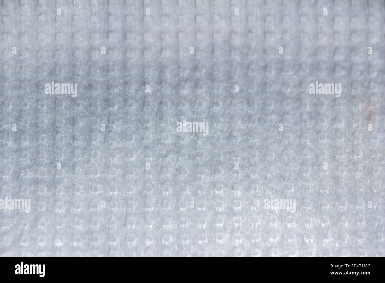 Macro full frame texture background of a pressed medical cotton fabric ...