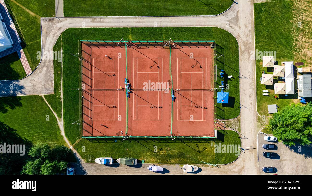 Aerial shot of an empty tennis court in the countryside Stock Photo - Alamy