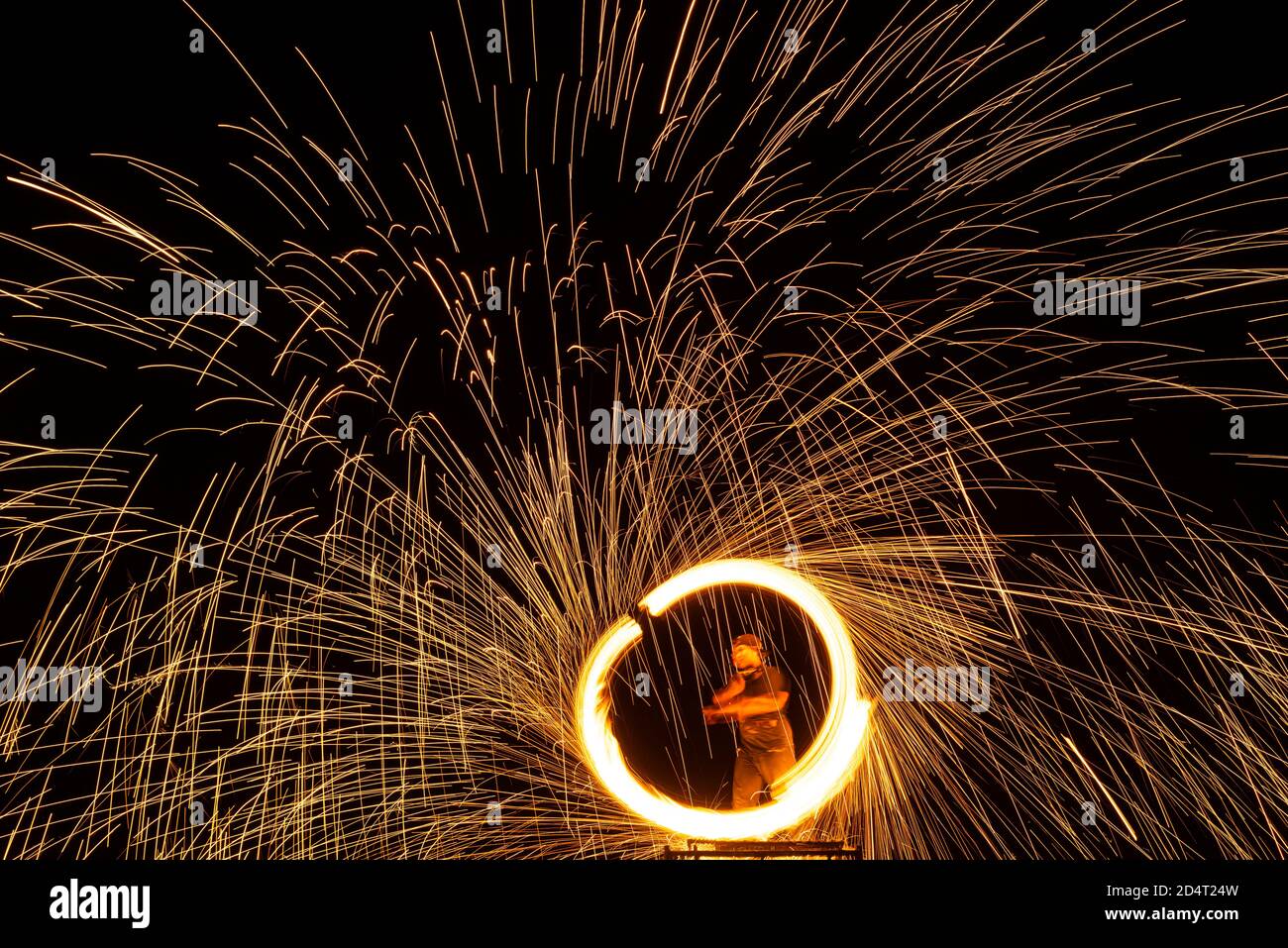 Fire show at night in Thailand Stock Photo - Alamy