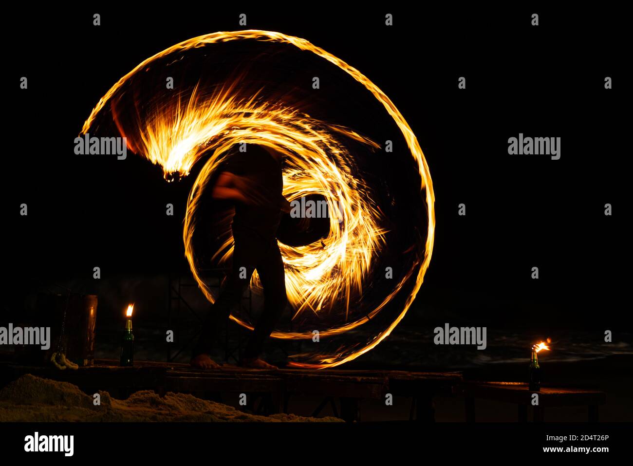 Fire show at night in Thailand Stock Photo - Alamy