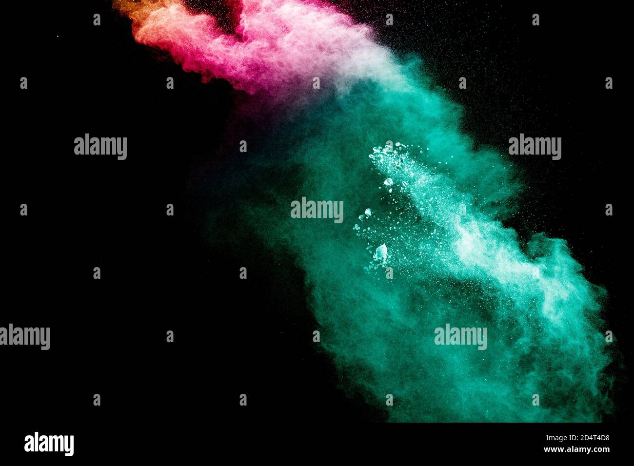Abstract multi color powder explosion on black background Stock Photo ...