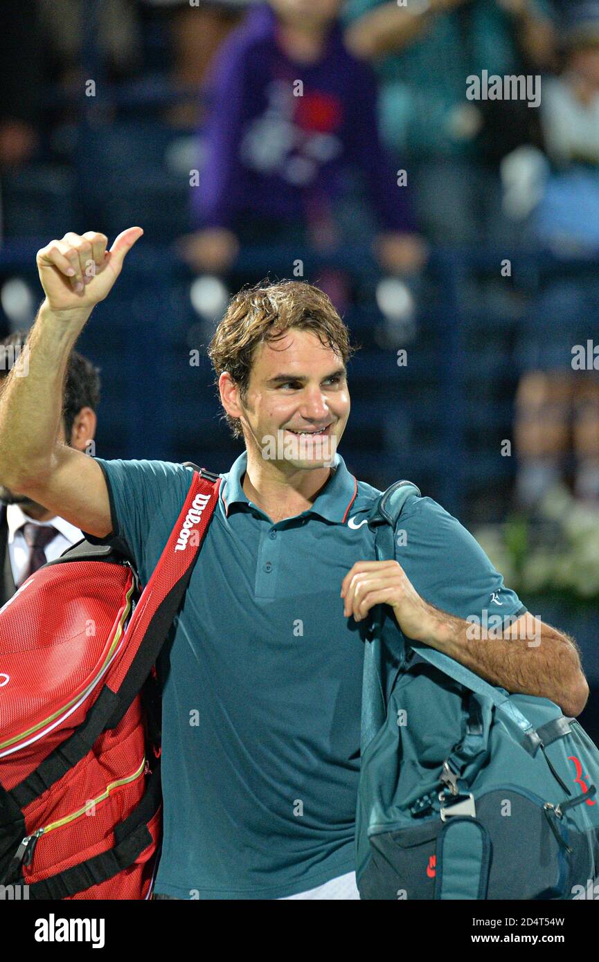DUBAI, UAE, 27th Feb 2014. Roger Federer smiles to the crowd after a ...