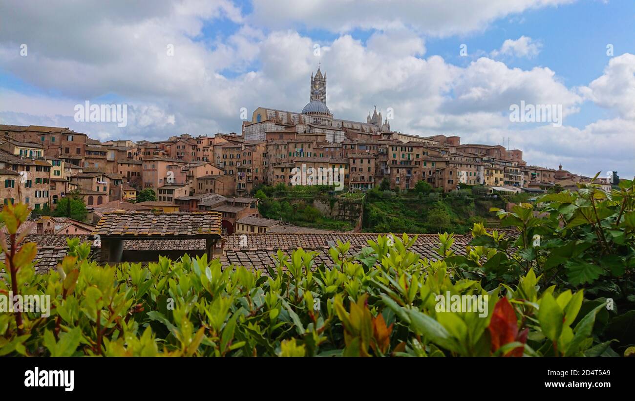 SIENA, ITALY - APRIL 26, 2019: View to the old town in Siena Stock ...