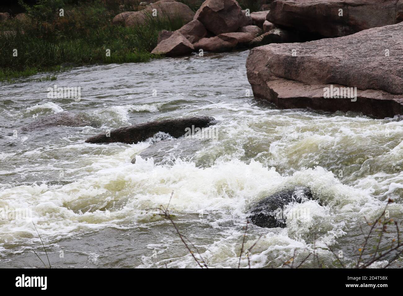 Water flow through rocks Stock Photo - Alamy