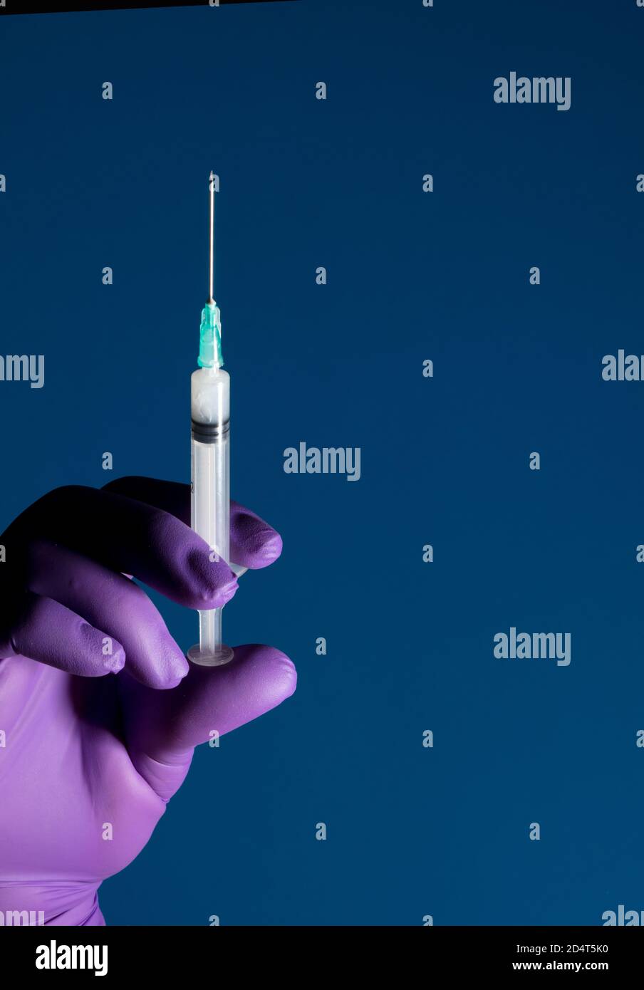 Syringe, medical injection in the hand, palm or fingers. Plastic ...