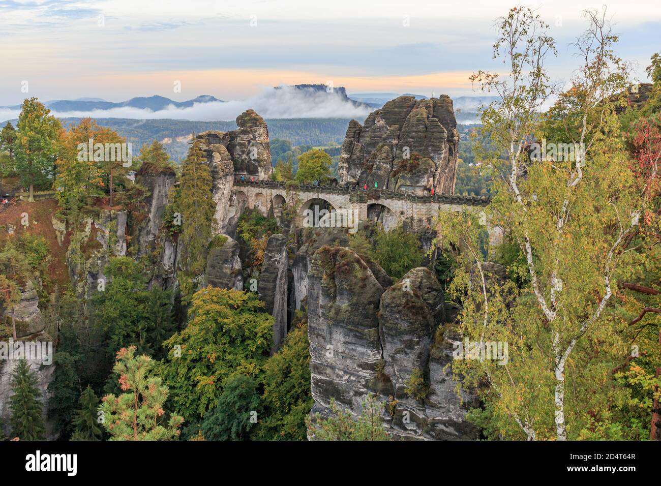 Typical tourist view to the Bastei bridge in the Saxon Switzerland near ...