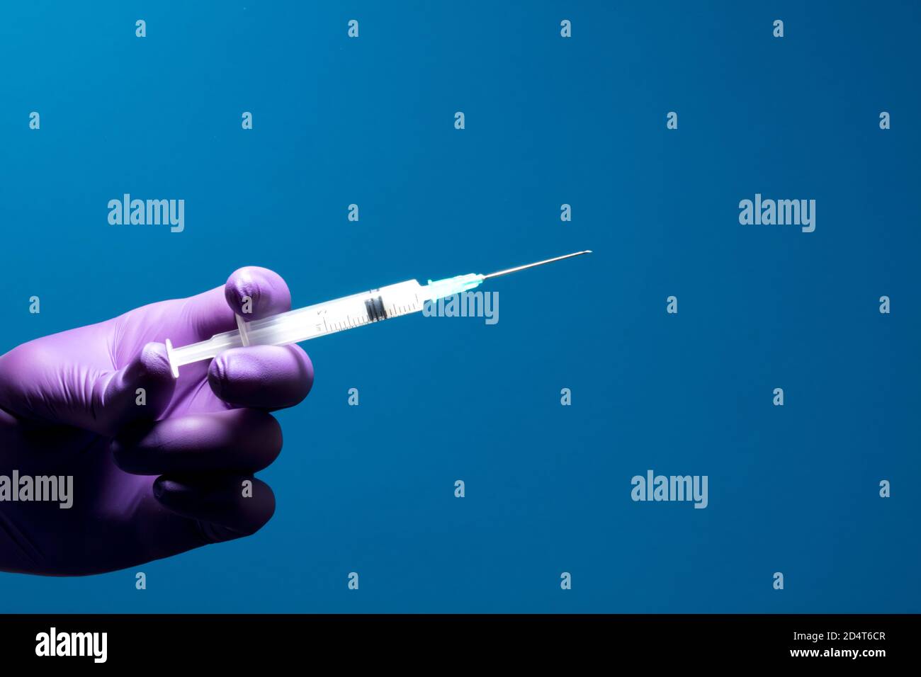 Syringe, medical injection in the hand, palm or fingers. Plastic ...