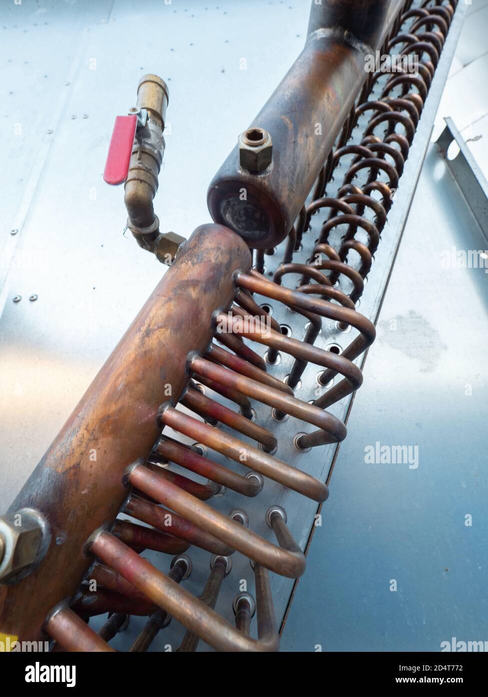 Brass heat radiator and industrial cooler detail. Ribbed box cooling ...