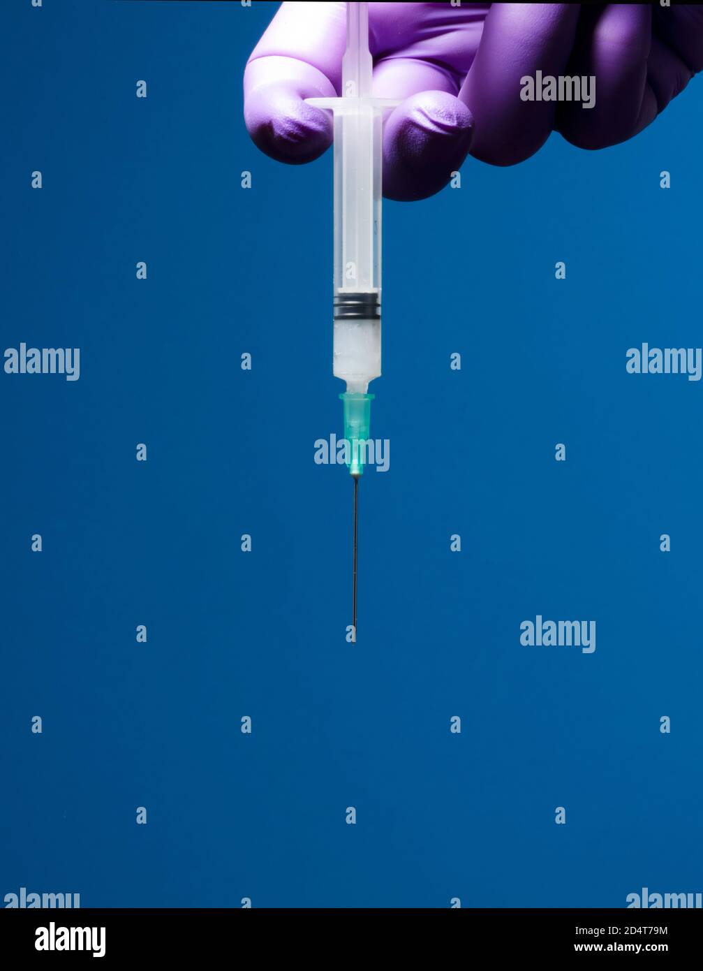 Syringe, medical injection in the hand, palm or fingers. Plastic ...