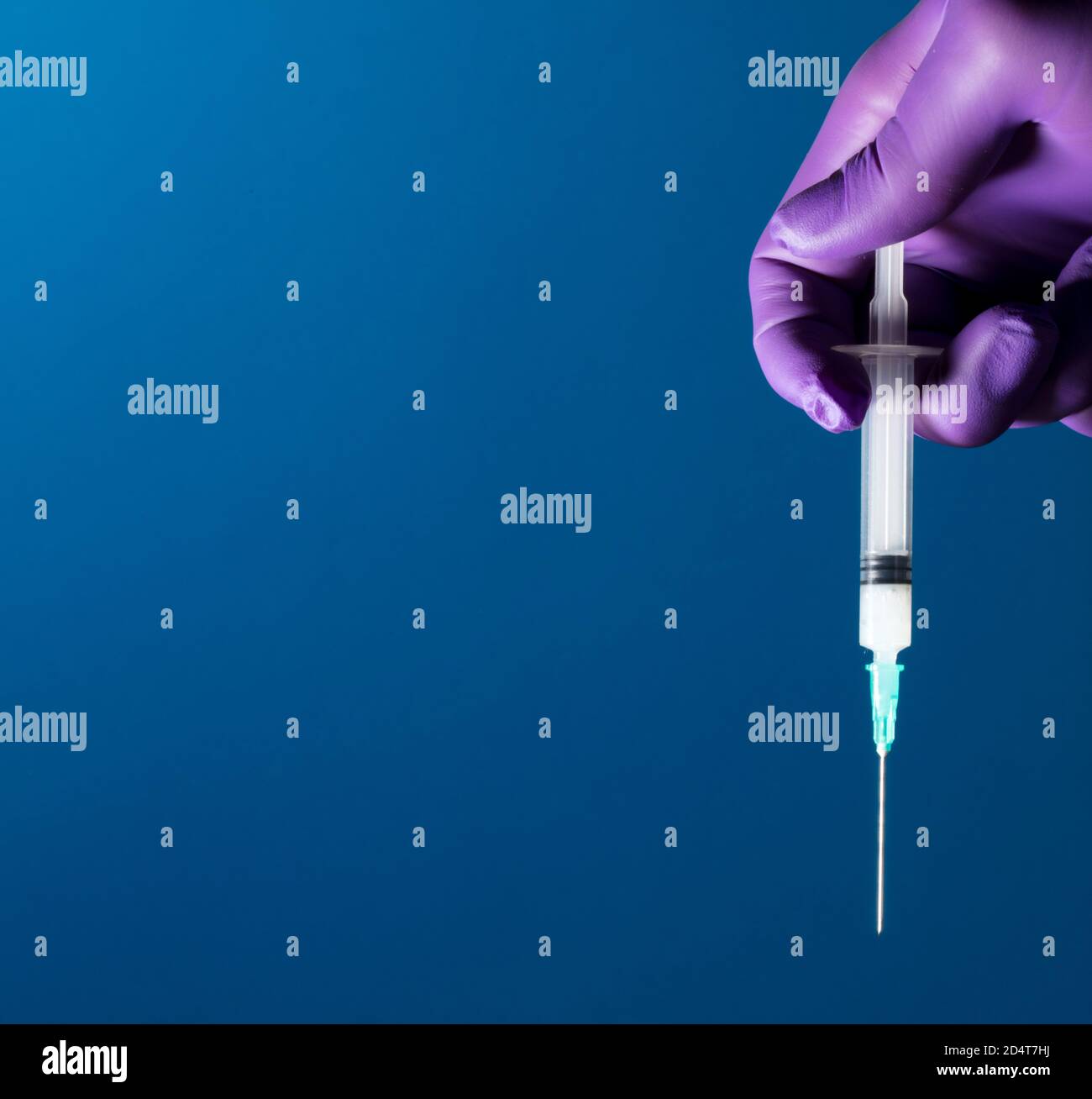 Syringe, medical injection in the hand, palm or fingers. Plastic ...