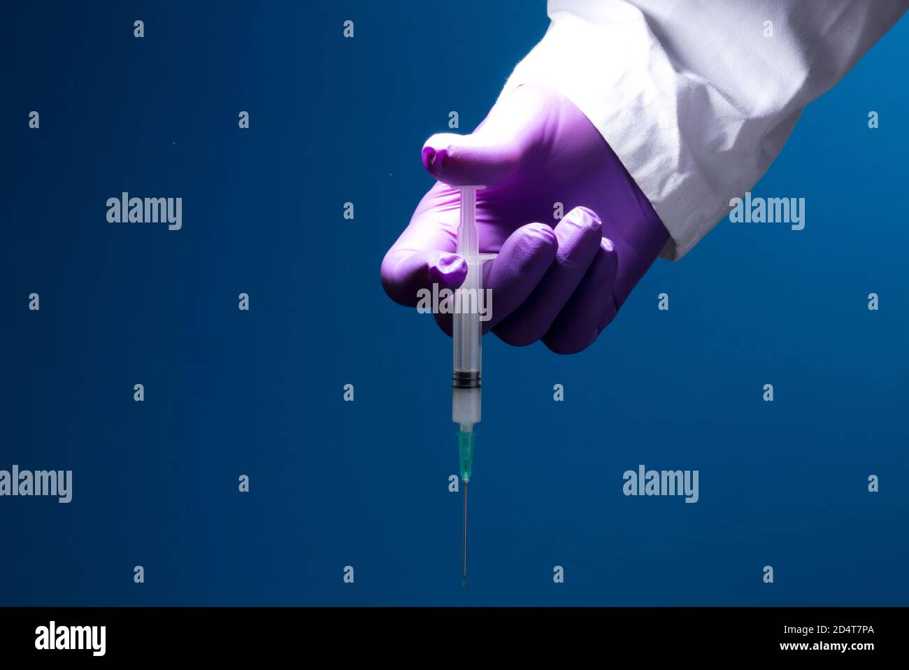 Syringe, medical injection in the hand, palm or fingers. Plastic ...