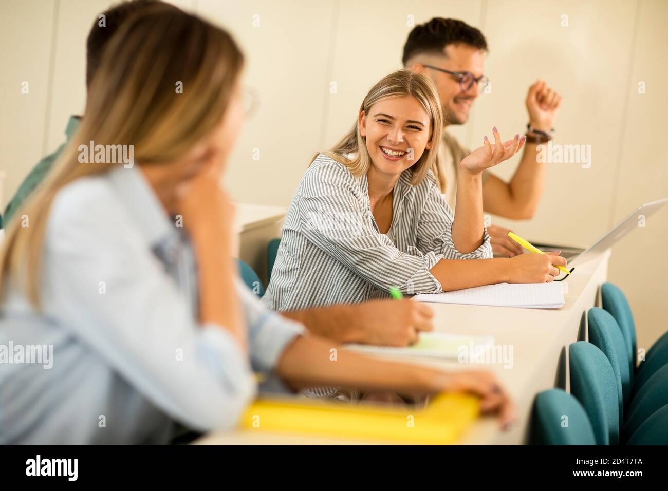 Group of university students in the classroom Stock Photo - Alamy