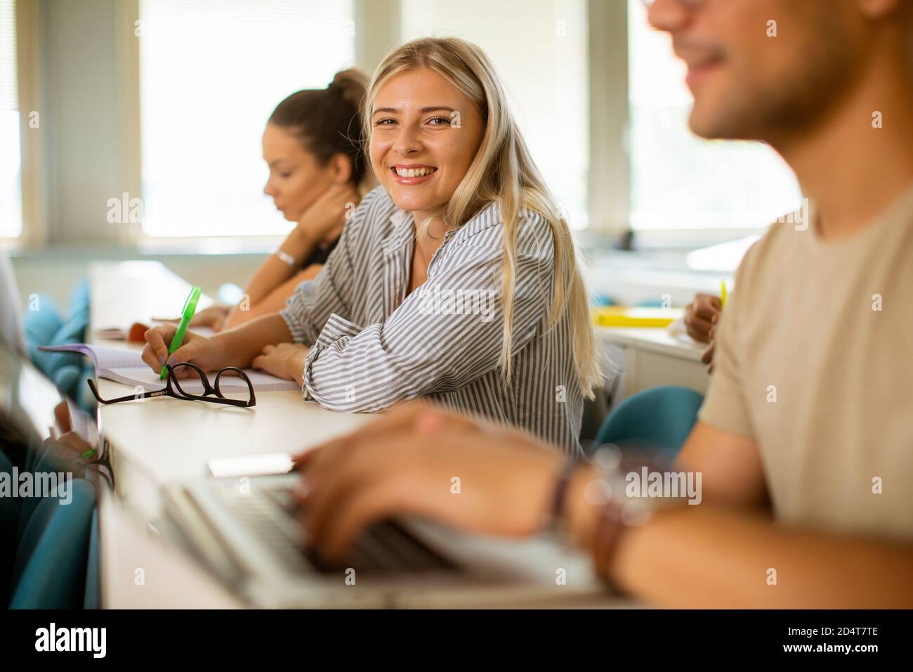 Group of university students in the classroom Stock Photo - Alamy