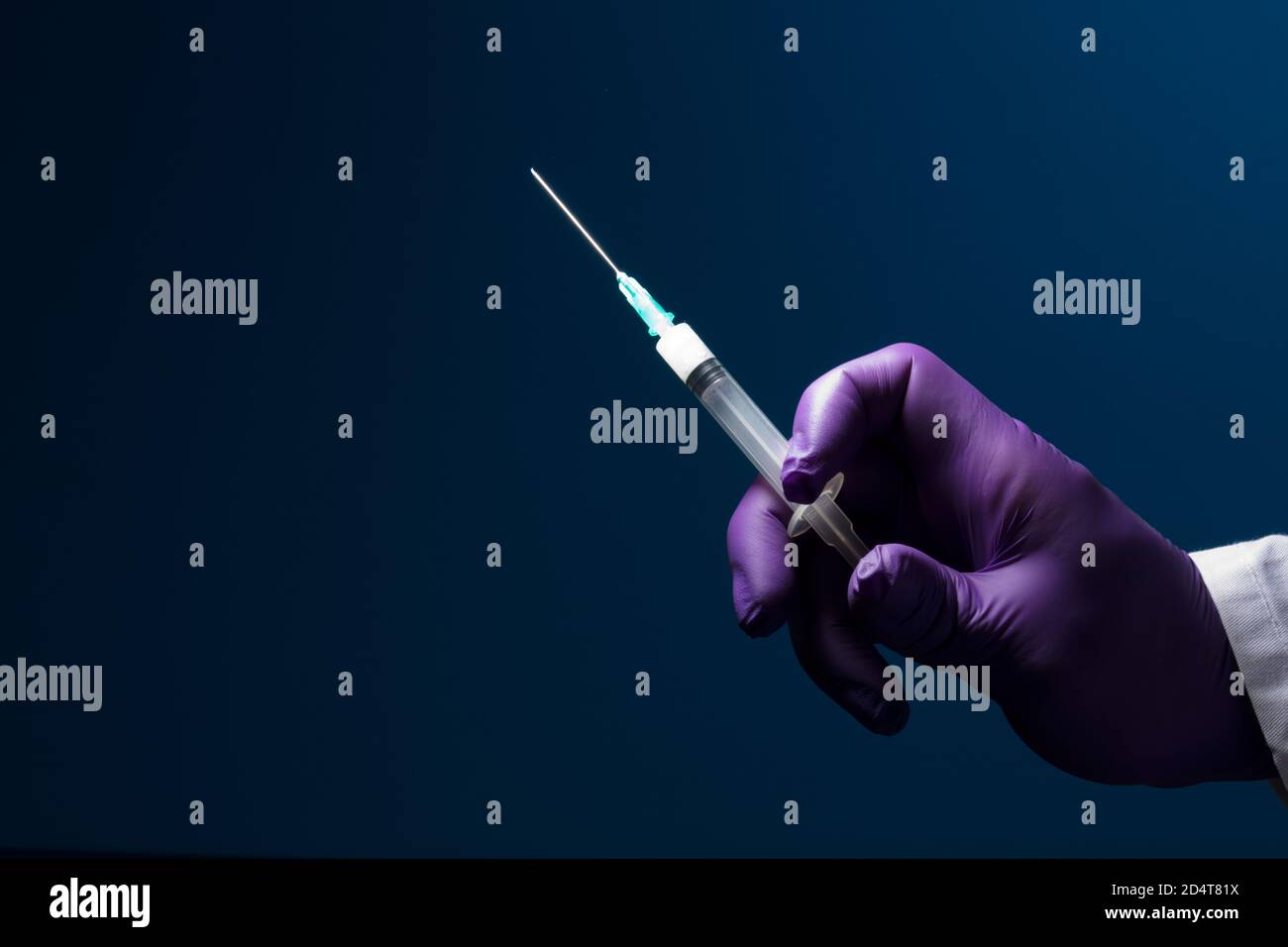 Syringe, medical injection in the hand, palm or fingers. Plastic ...