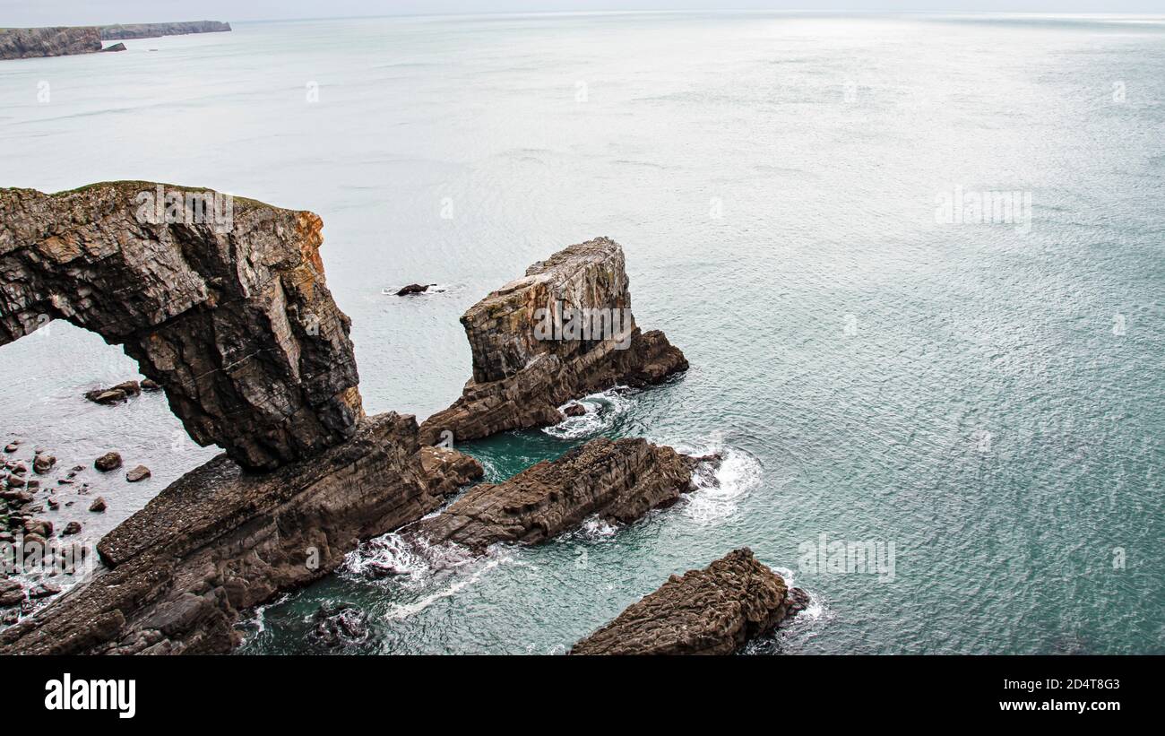 Stack Rocks & The Green Bridge of Wales Stock Photo - Alamy