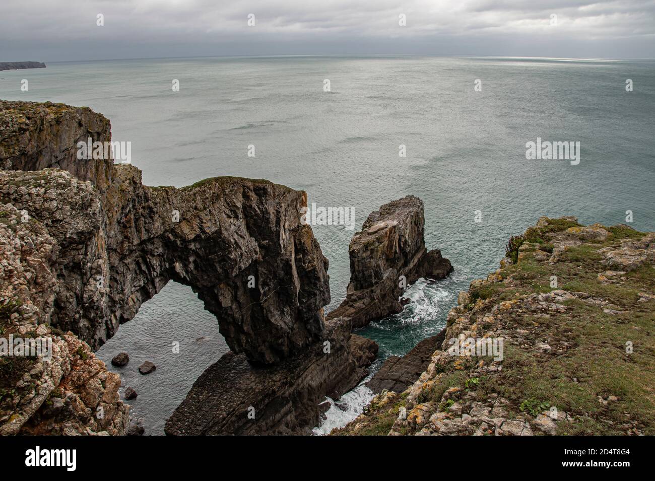 Stack Rocks & The Green Bridge of Wales Stock Photo - Alamy