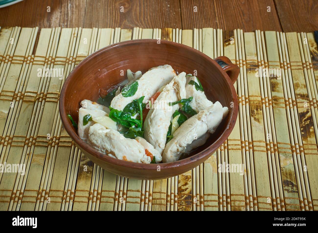 Poulet fafa - traditional chicken Tahitian dish Stock Photo - Alamy